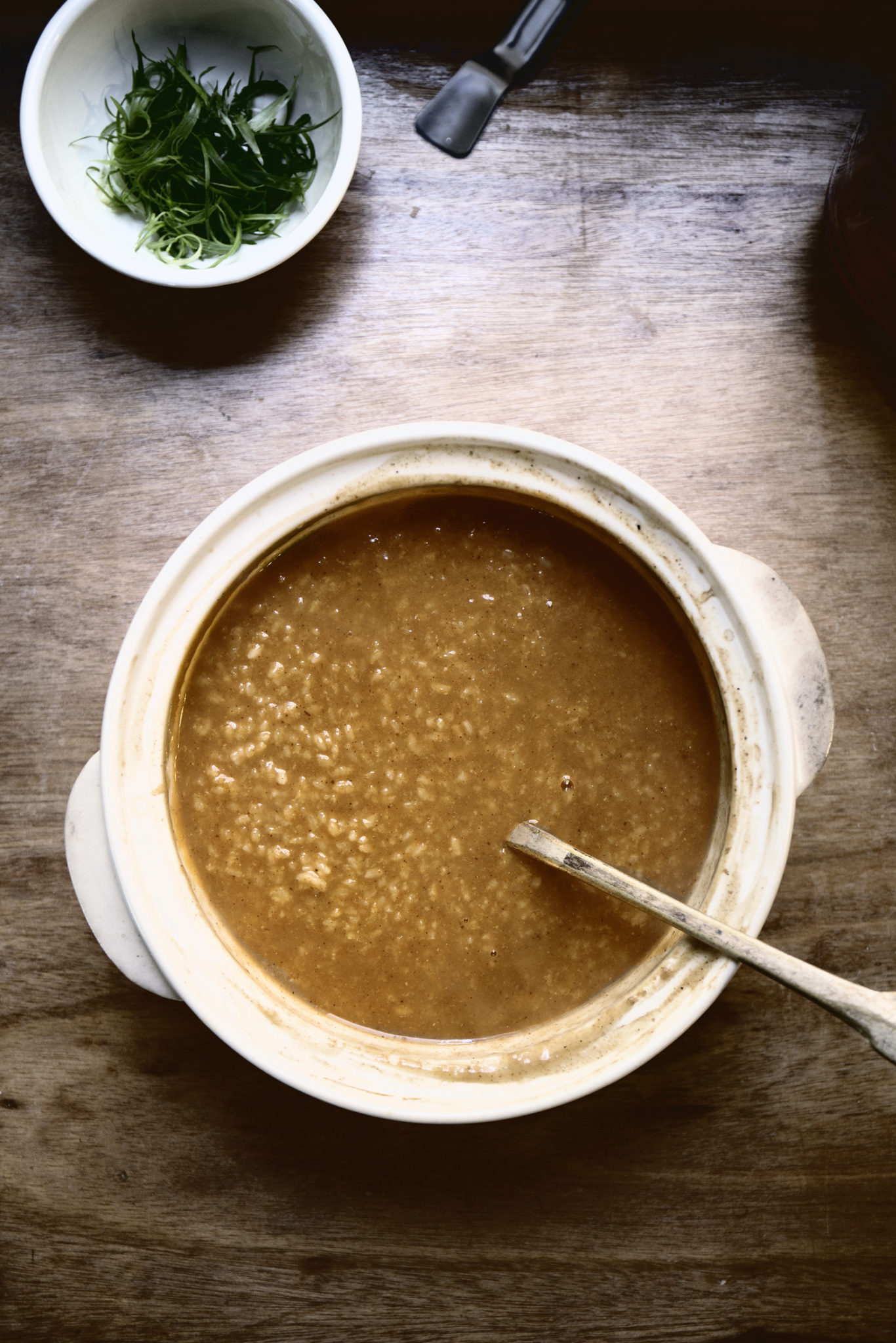 Miso congee w/ crispy scallion oil and cream